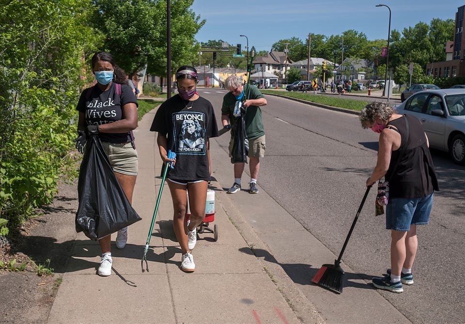 People Cleaning The Streets
