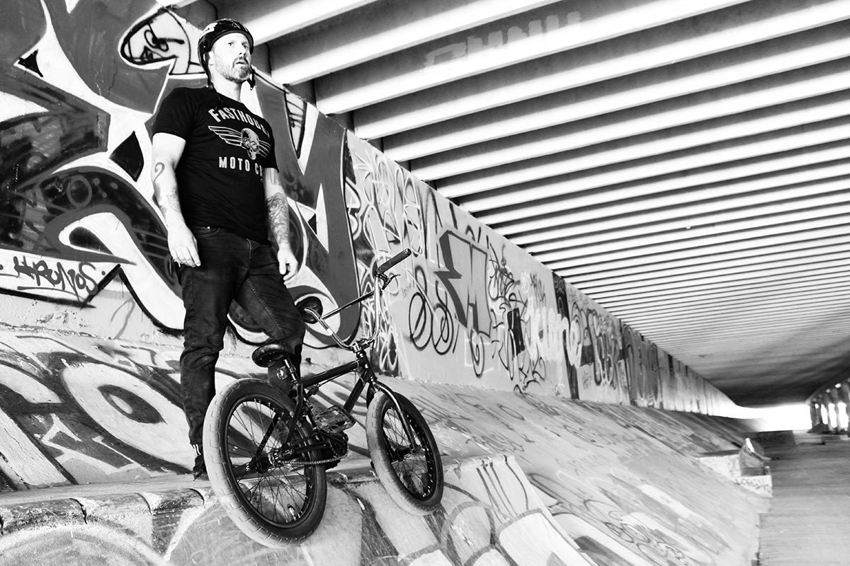Chris Rhoades | Four Strings & Two Wheels - Fasthouse