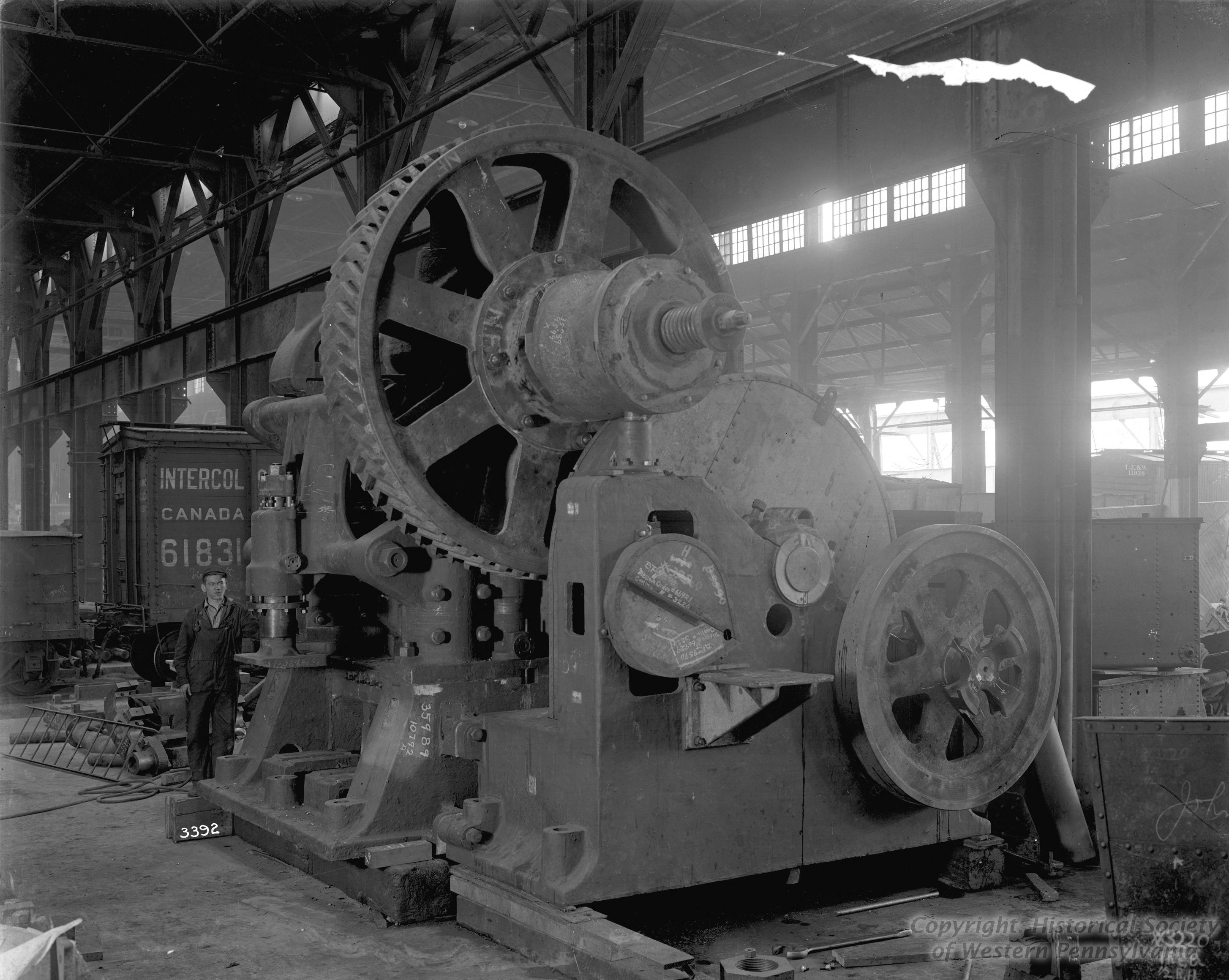 High-quality black-and-white photographs of large old machines and ...