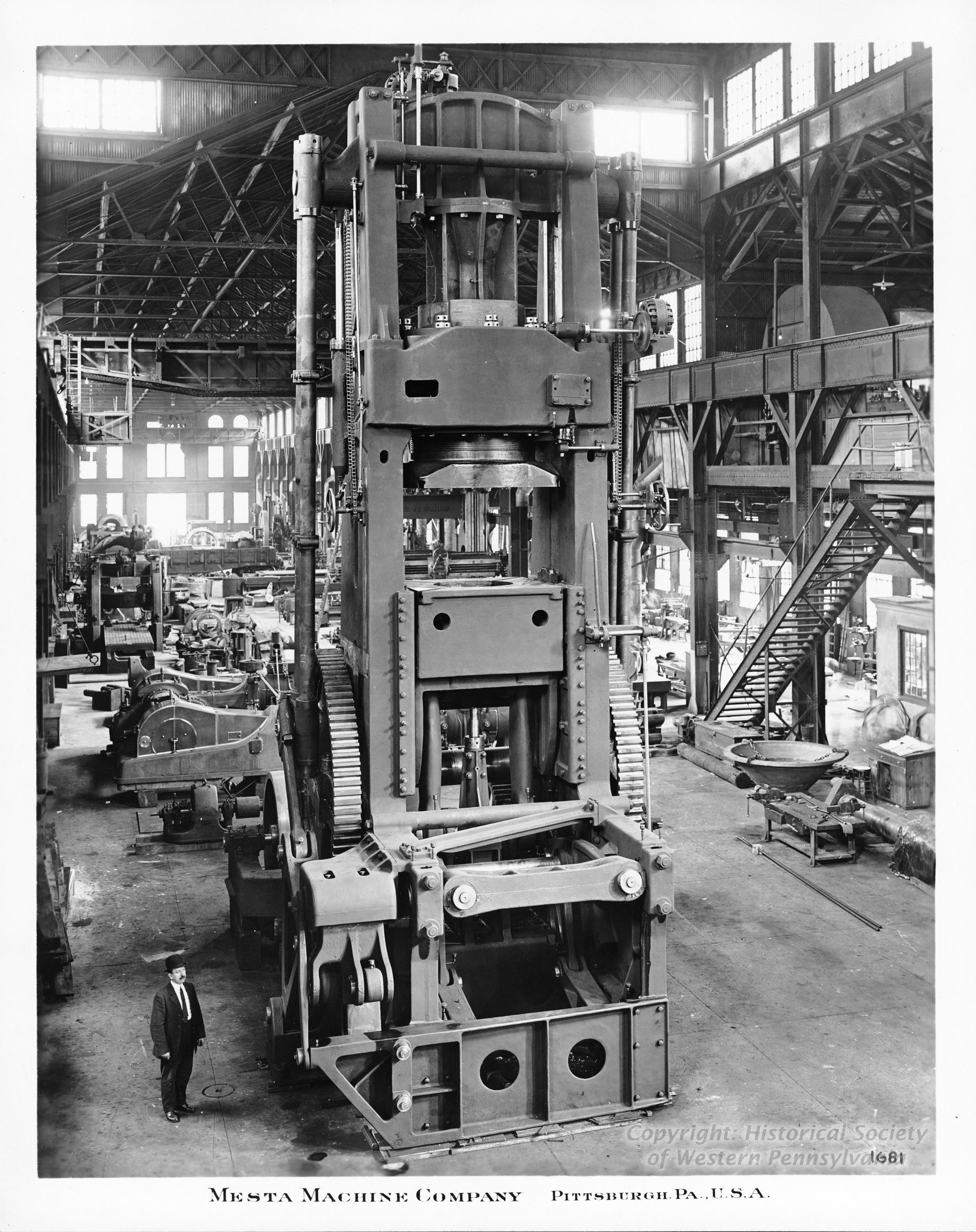 High-quality black-and-white photographs of large old machines and ...