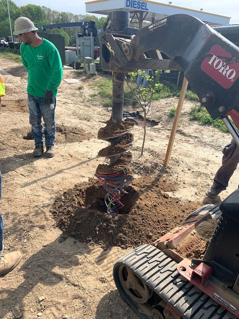 Utility cables hit by auger - photo