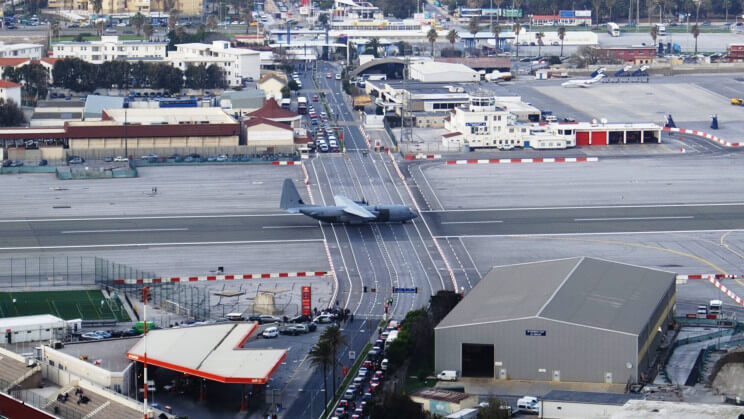 Highway intersecting runway - photo