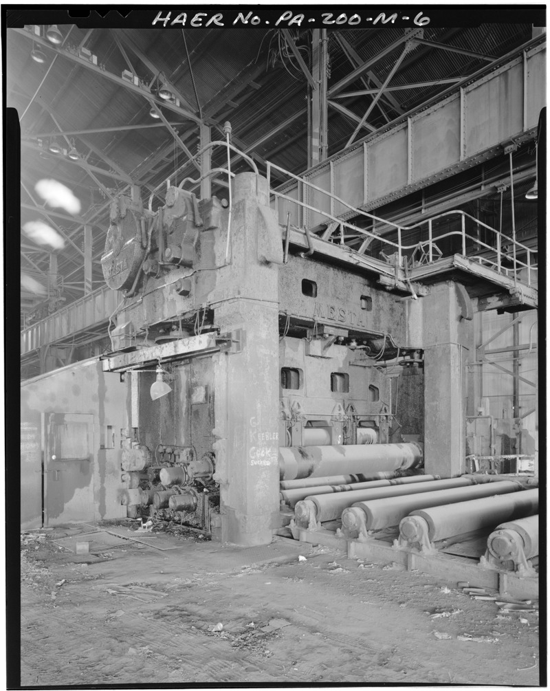 High-quality black-and-white photographs of large old machines and ...