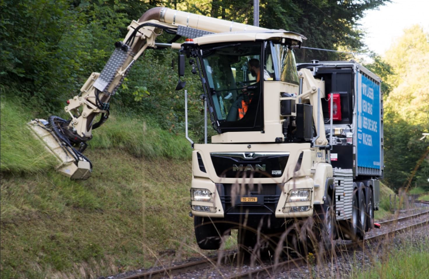 Road-rail mower vacuum truck - photo