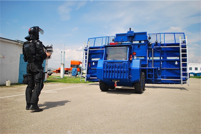 Skid steer modified into riot control vehicle - HomemadeTools.net