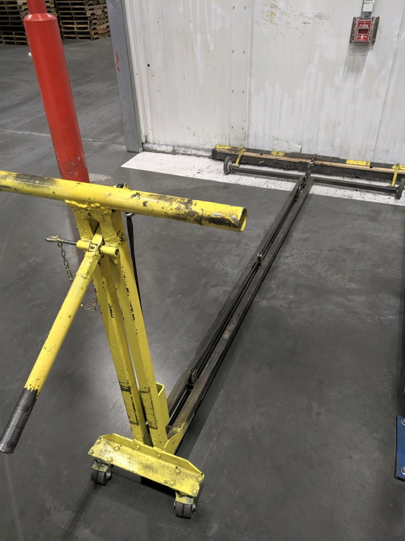 Broom for cleaning under warehouse racks - photo - HomemadeTools.net